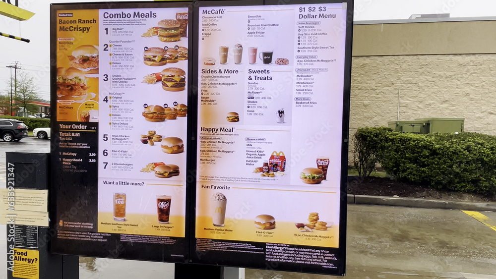 McDonalds fast food restaurant exterior drive thru menu Stock Photo ...