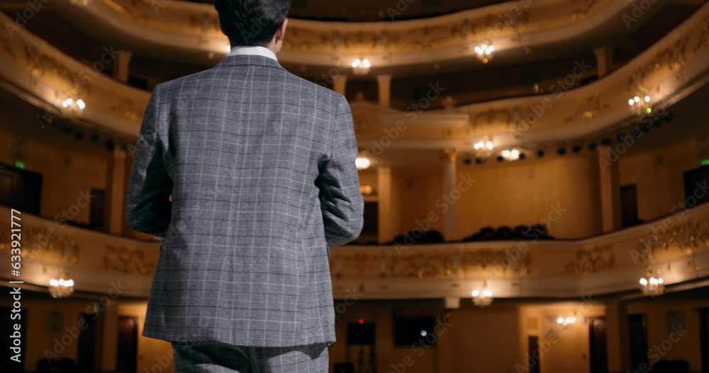 man in suit begins lecture, lesson about motivation, training from ...