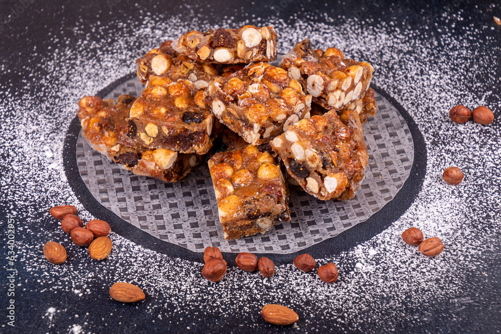 Italian sweet nuts, hazelnuts, almonds, figs, honey dessert over on ...