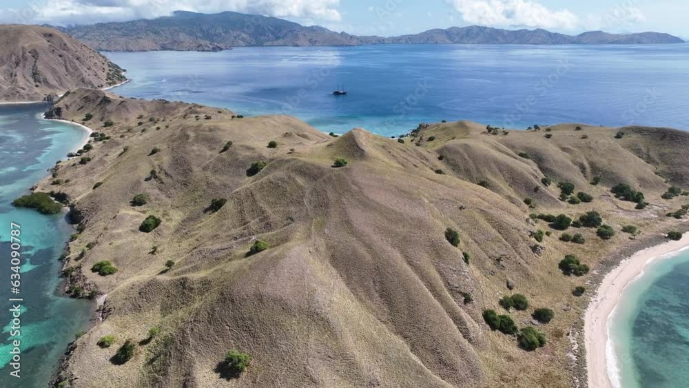 Beautiful coral reefs fringe the scenic island of Gili Lau Laut in ...