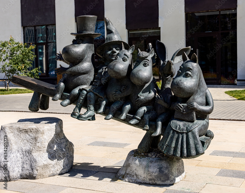 Moomins (mummy trolls) on the bench sculpture from classic children's ...
