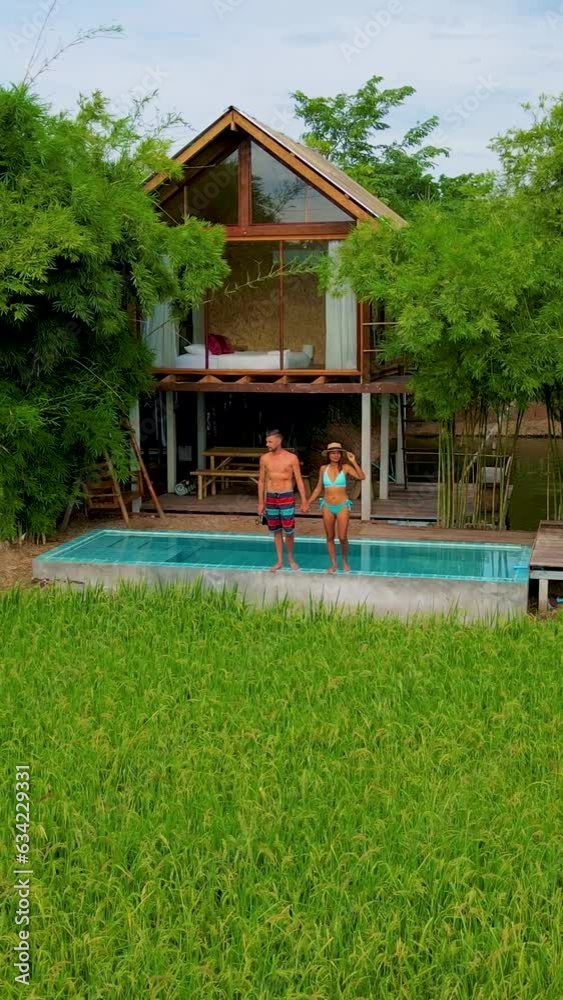 Bamboo hut homestay farm with Green rice paddy fields in Central ...