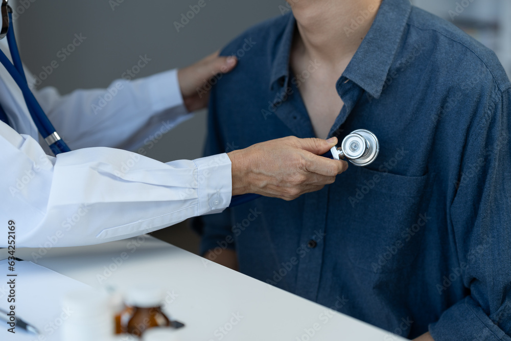 Health care and treatment concept. Senior female doctor using ...