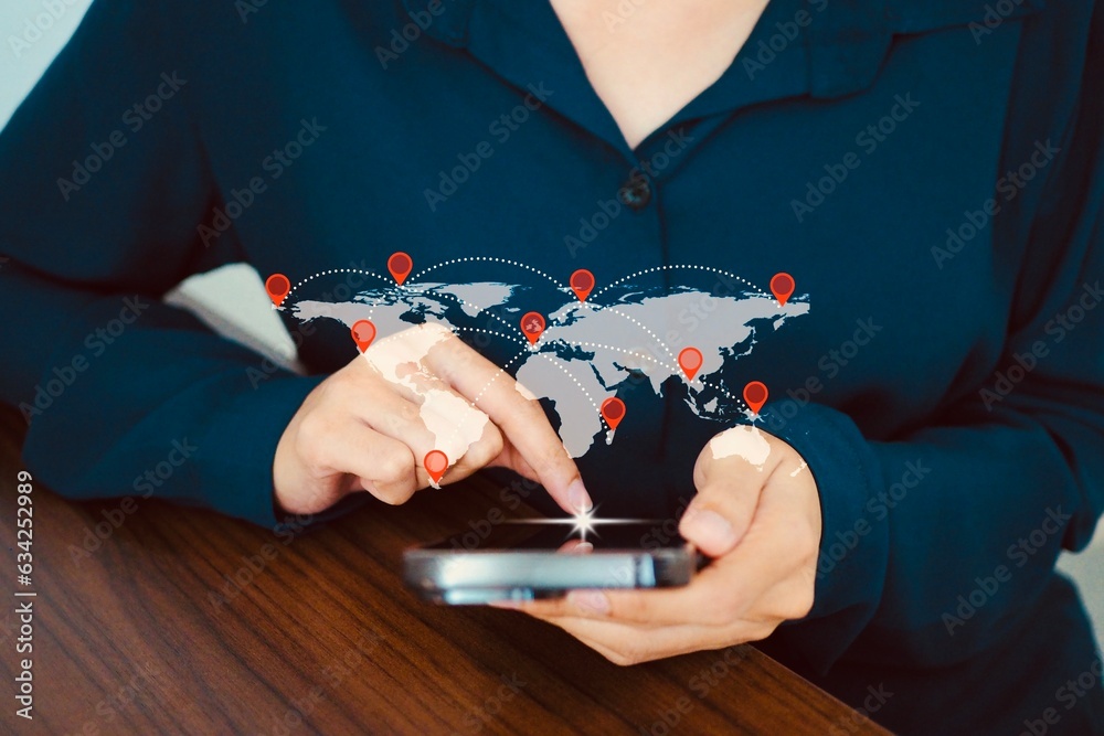 Businessman touching mobile phone with world map for global ...