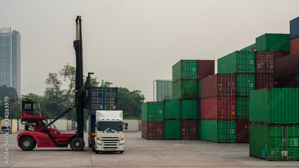 Forklift Truck loading Container to Cargo Truck Forklift working in the ...