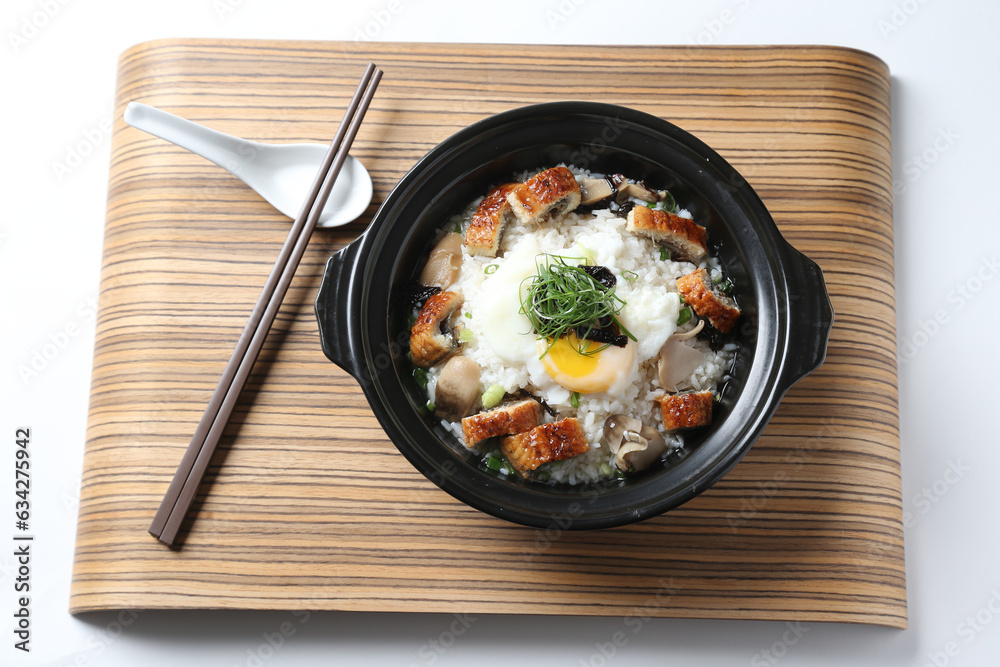Hong Kong congee porridge rice with seafood unagi fish, mushroom, egg ...