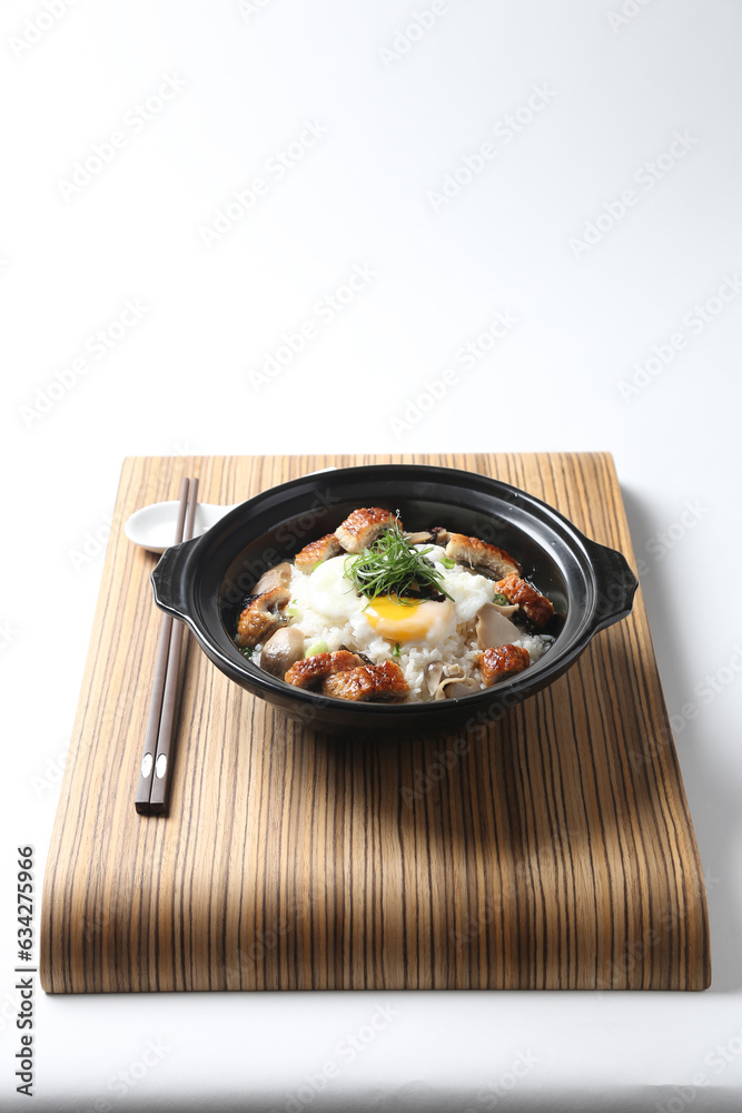 Hong Kong congee porridge rice with seafood unagi fish, mushroom, egg ...