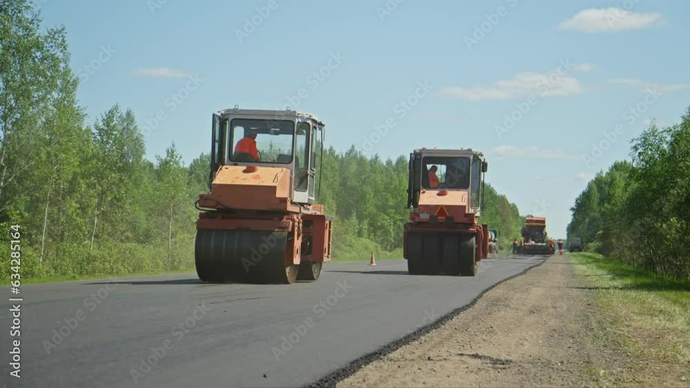 Roadway repair. Repair surface of road. Process of laying asphalt with ...
