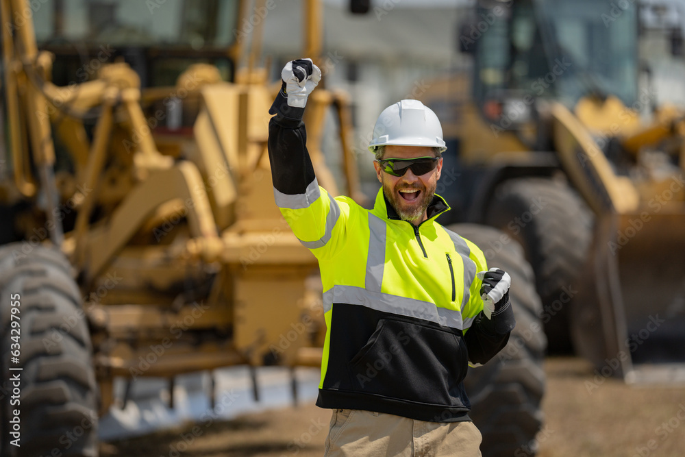 Excavator loader tractor and buider worker. Construction builder in ...