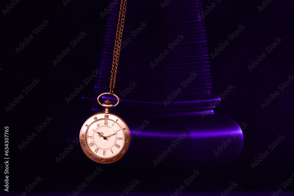 Hypnosis session. Vintage pocket watch with chain swinging over surface ...