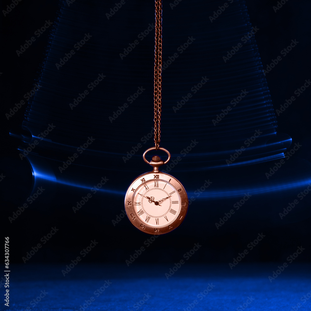 Hypnosis session. Vintage pocket watch with chain swinging over surface ...