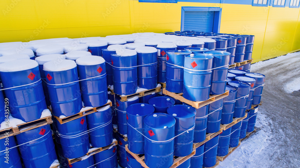 Barrels for chemistry. Warehouse of chemical products. Blue barrels on ...