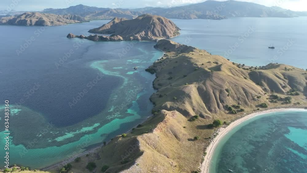 Beautiful coral reefs fringe the scenic island of Gili Lau Laut in ...
