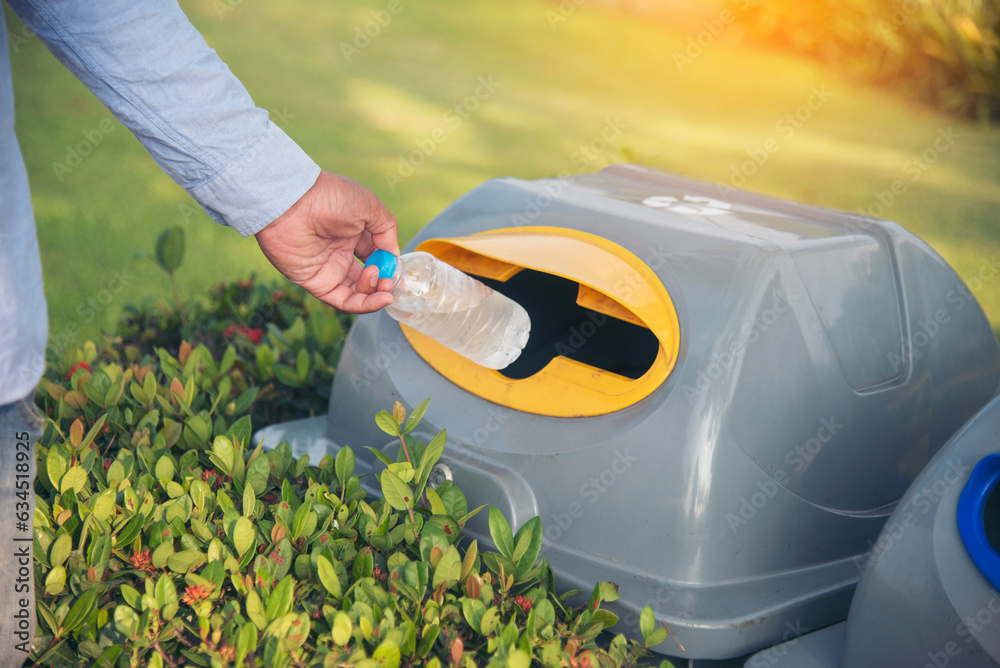 Men hands trow Trash cans for sorting garbage recycle bin waste plastic ...