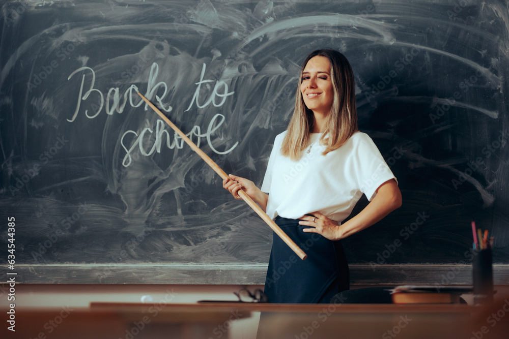 Happy Teacher Welcoming Kids to a New School Year. Nice smiling ...