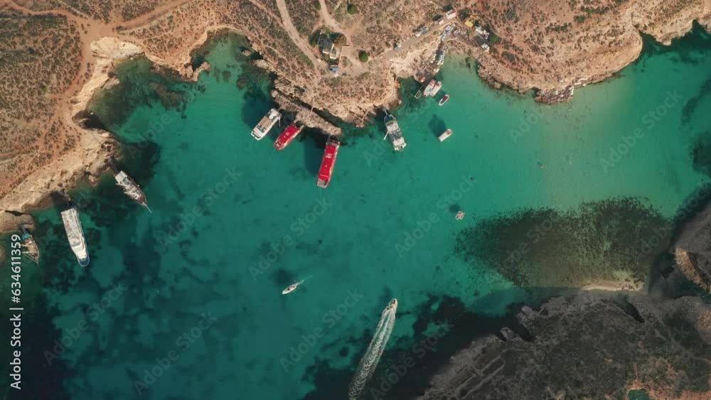Bird's eye drone view of Malta's breathtaking Blue Lagoon, renowned for ...