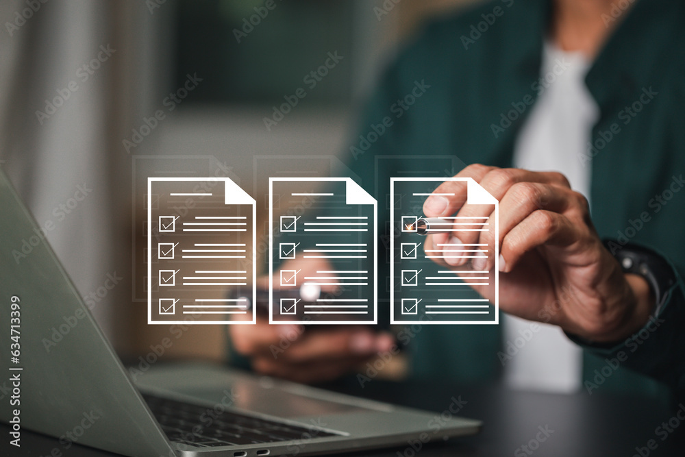 Performance checklist, businessman using checklist survey, filling out ...