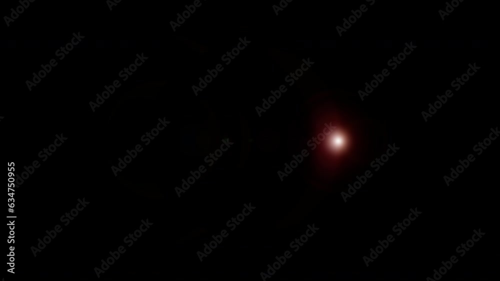 A total solar eclipse in the starry sky with falling meteors with a ...