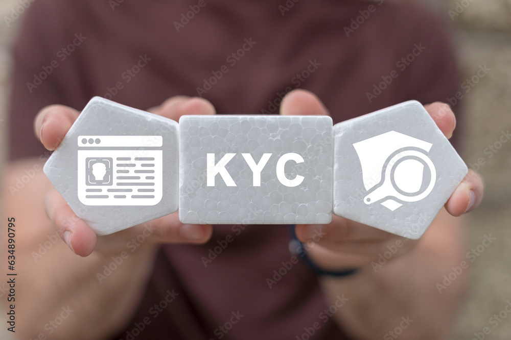 Man holding white plastic foam blocks with icons and sees abbreviation ... Man holding white plastic foam blocks with icons and sees abbreviation ...