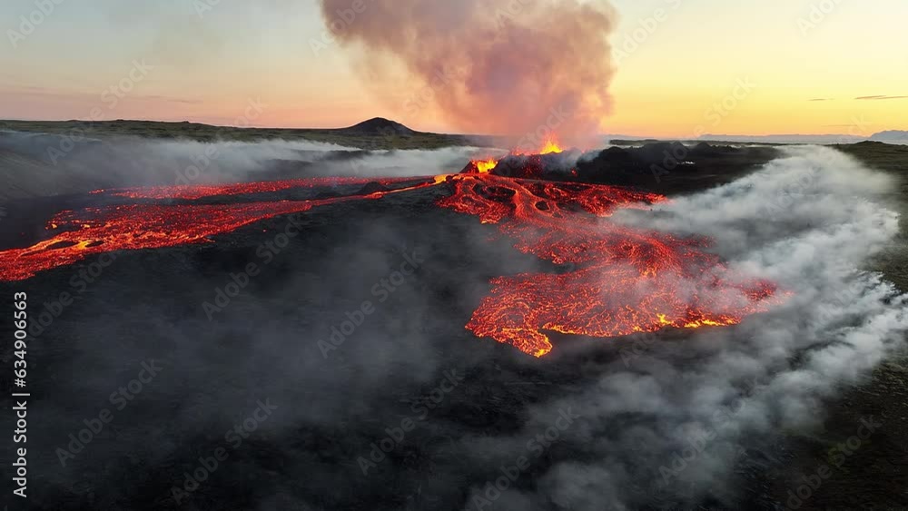 Volcano eruption, red hot burning lava erupts from ground, drone fly ...