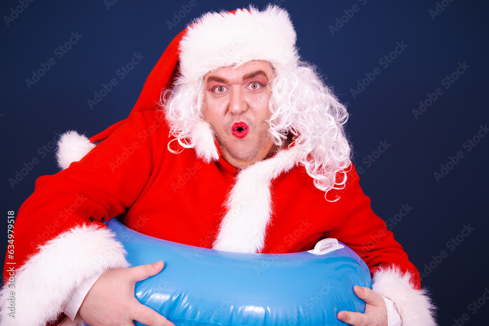 Christmas and New Year. Funny Drag Queen dressed as Santa Coat posing ...