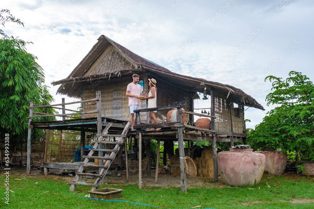 Bamboo hut homestay farm with Green rice paddy fields in Central ...