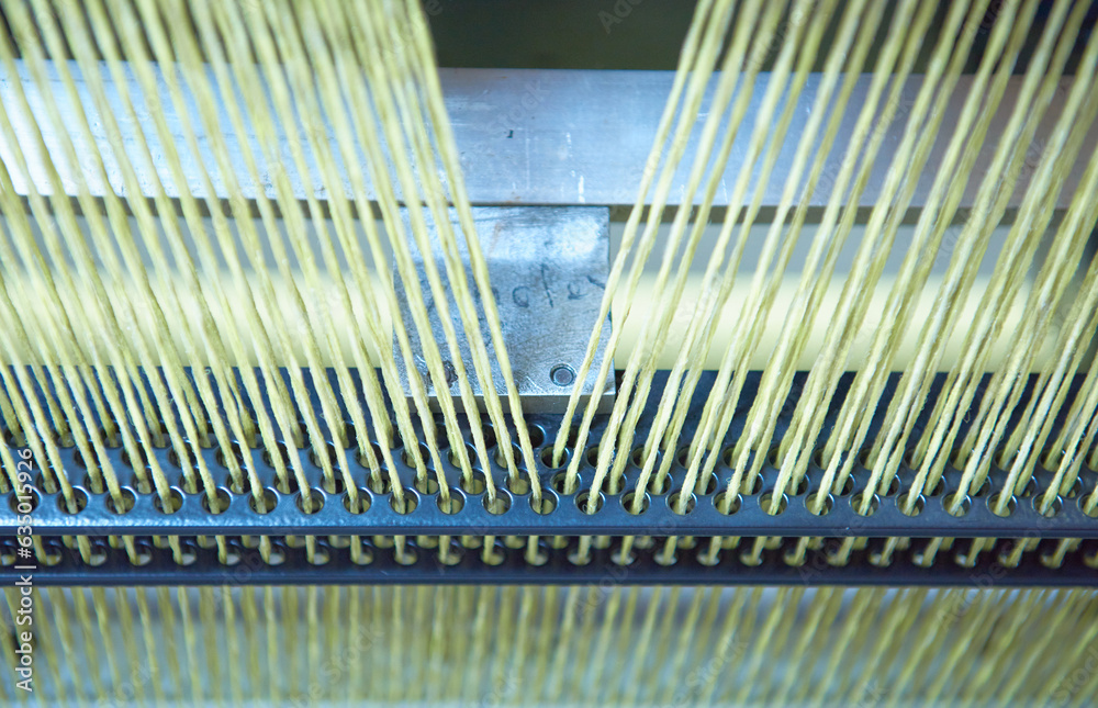 Cotton threads in industrial cotton in a weaving factory, machine ...