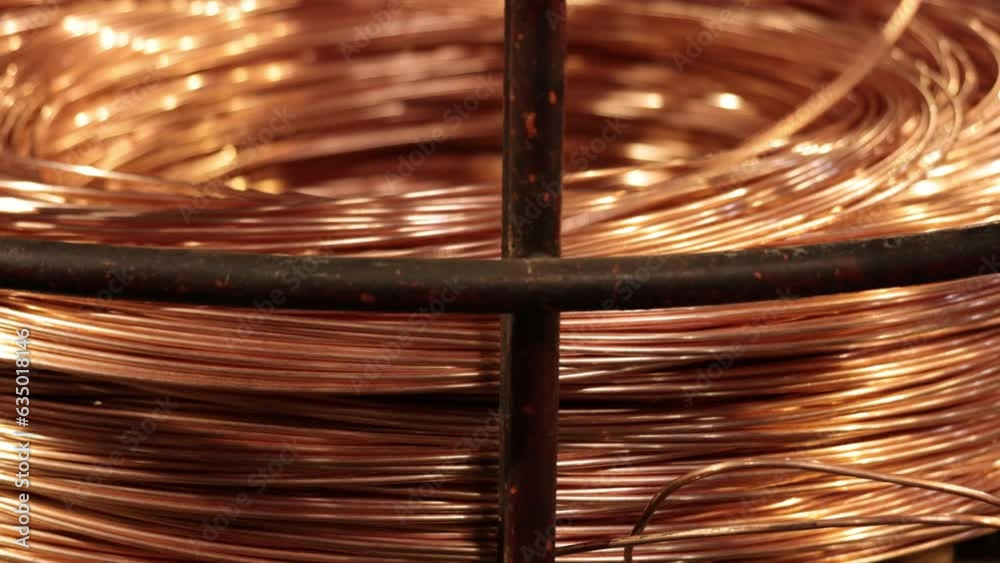 Wire coiling, cable making, copper industry. In industrial setting ...