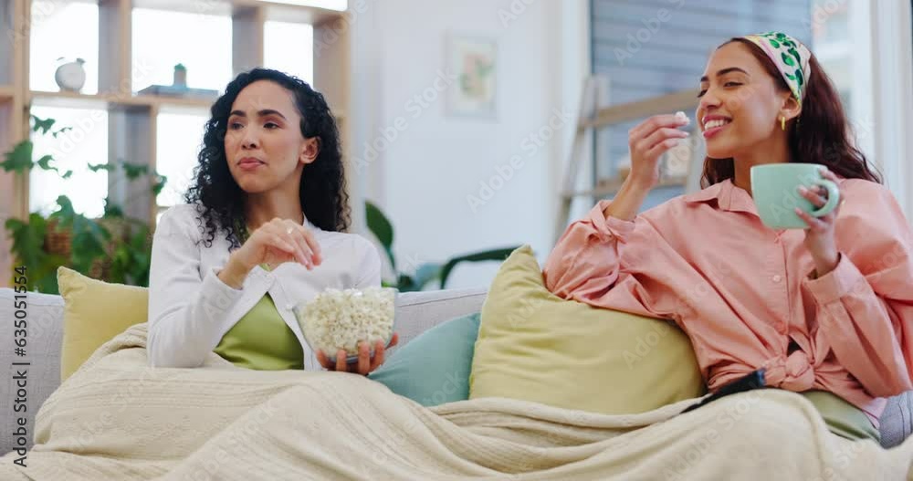 Eating popcorn, talking and happy friends watching tv, entertainment or ...