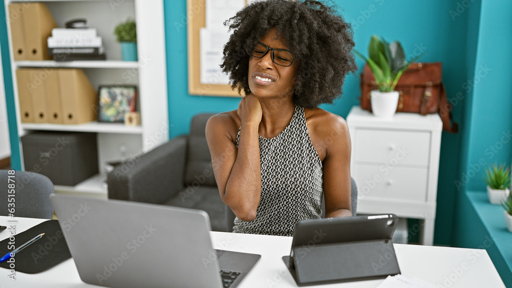 African american woman business worker using touchpad and laptop ...