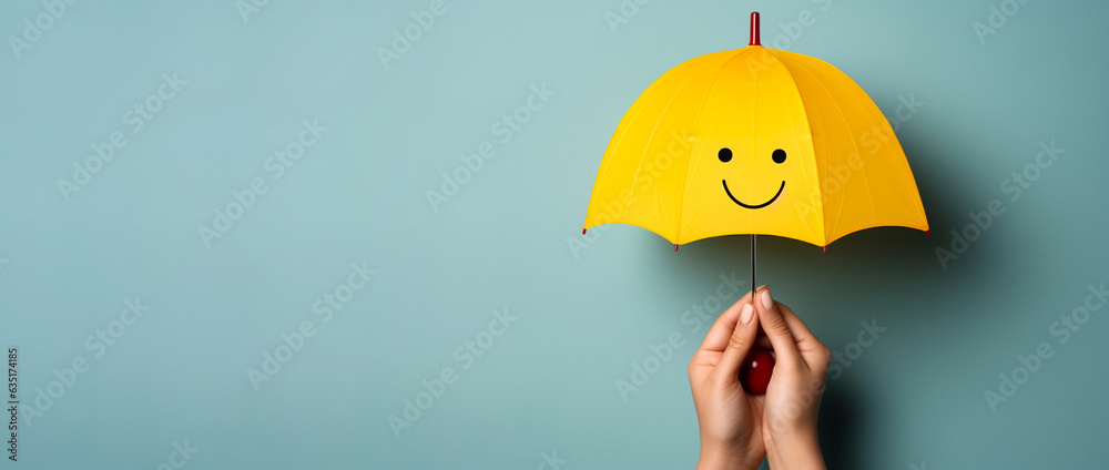 Human's hands hold umbrella with smile emoji, protects positive emotion ...