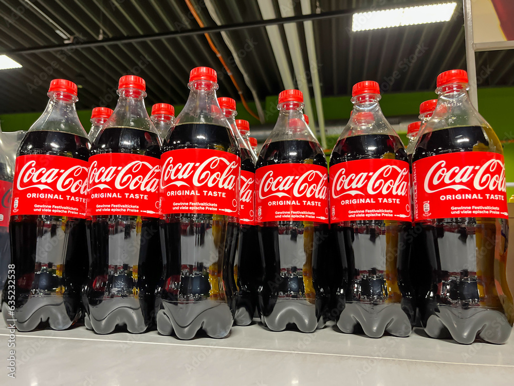 Multiple bottles of Coca-Cola Zero Sugar displayed in a store Stock ...