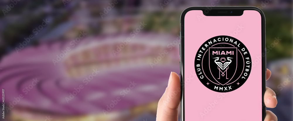 Logo of the Inter Miami CF on a smartphone on a pink background ...