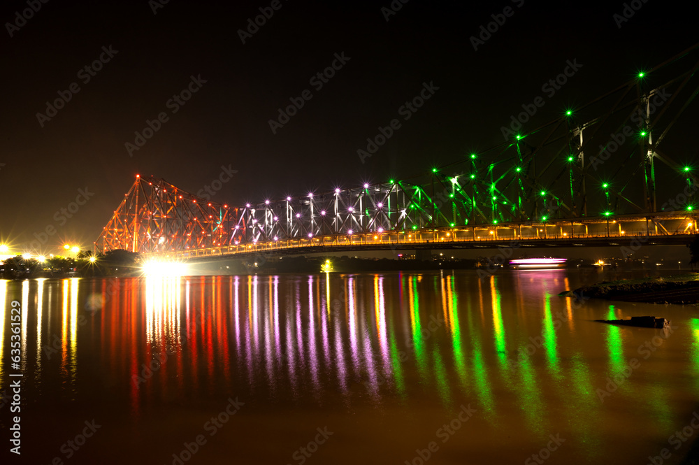 Howrah bridge - The historic cantilever bridge on the river Hooghly lit ...