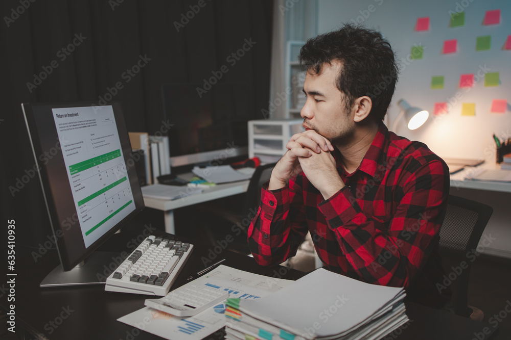 Startup company employees are working in the office overtime, overtime ...