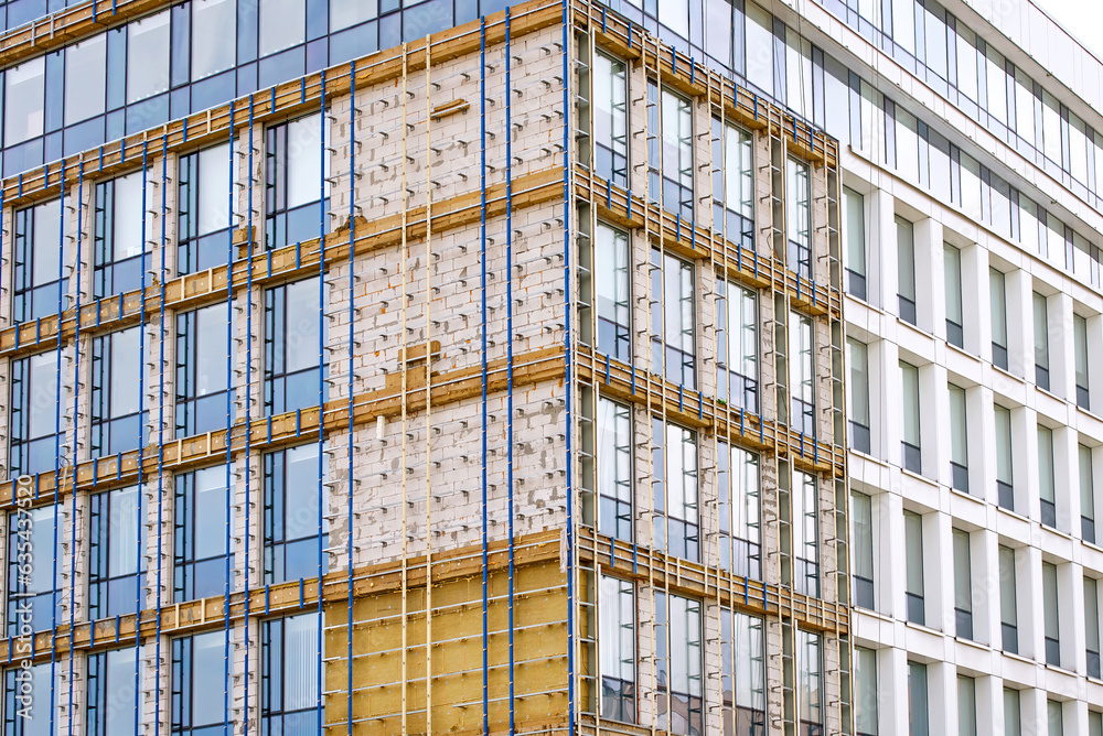 Cladding and facade insulation, installing process. Installation of ...