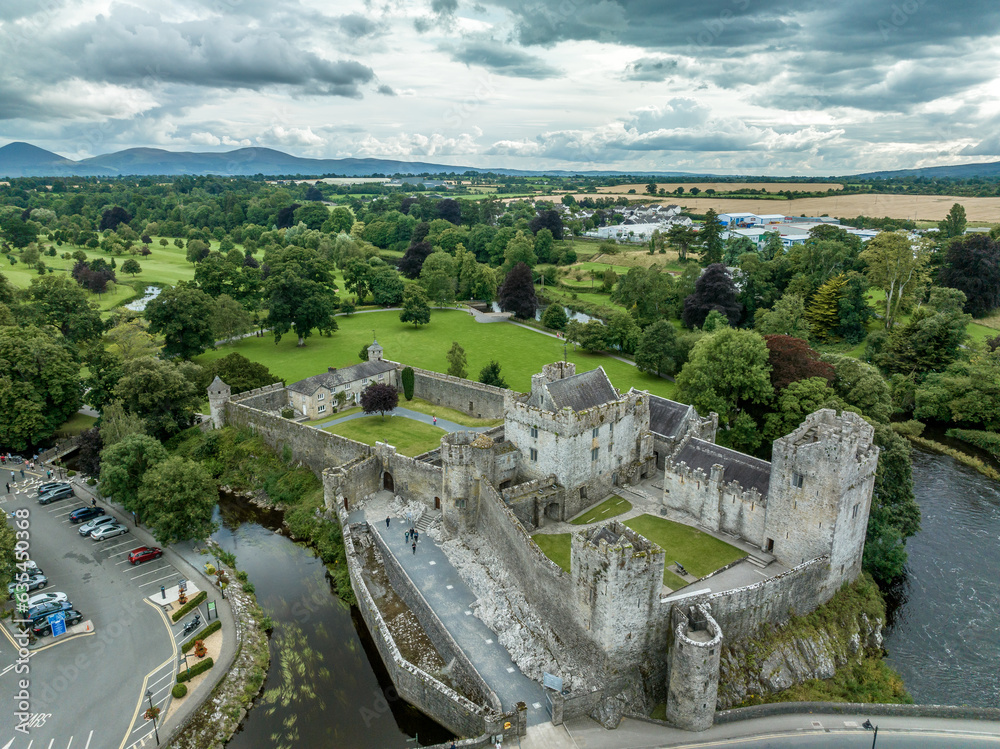 Aerial view of Cahir castle and town in Ireland with Tower House, outer ...