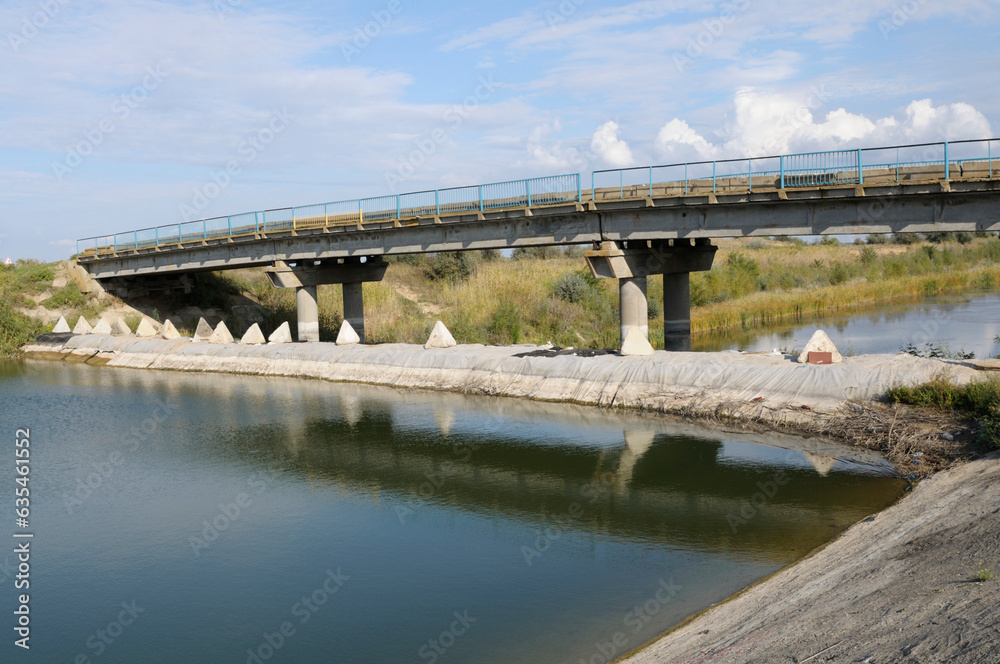 Temporary dam and bridge. North Crimean Canal near Ukrainian-Russian ...