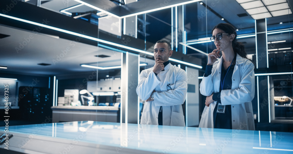 Multiethnic Male And Female Scientists Standing In the High-Tech ...