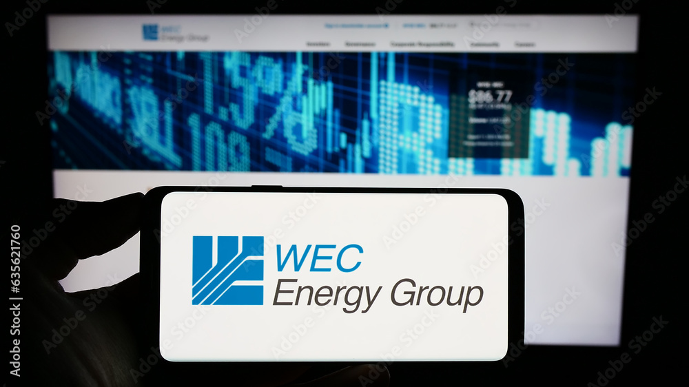 Stuttgart, Germany - 08-12-2023: Person holding cellphone with logo of ...