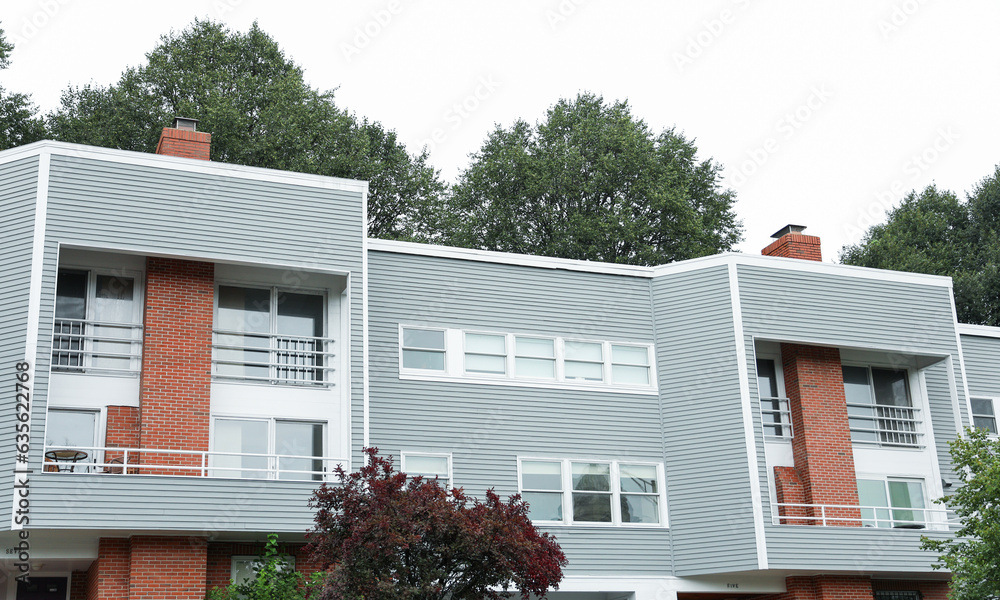 Glass-clad skyscraper represents modern real estate: growth, ambition ...