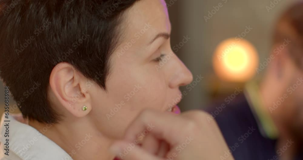 Close-up woman smiling watching talking. Active young woman close ...