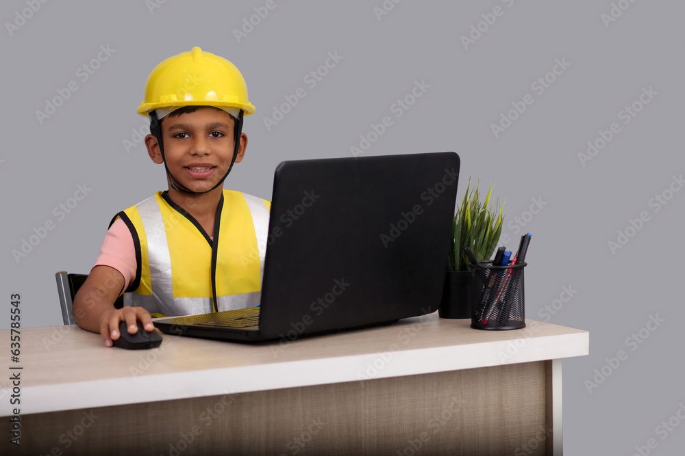 Indian Asian kid boy aged 7 to 8, wearing a yellow helmet and Safety ...