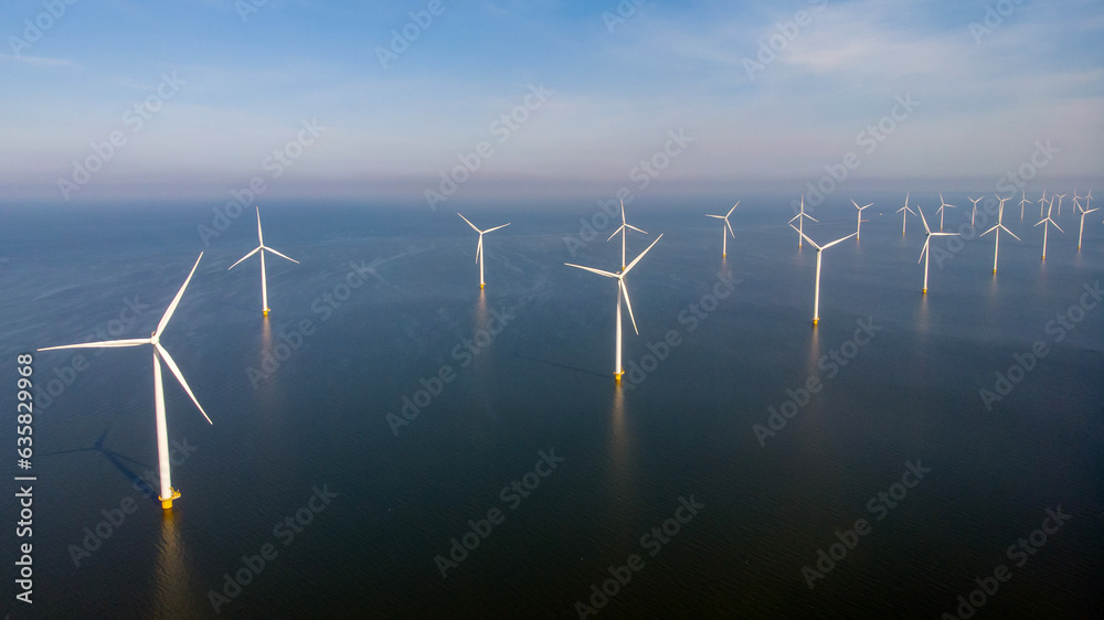 Windmill park in the ocean, drone aerial view of windmill turbines ...