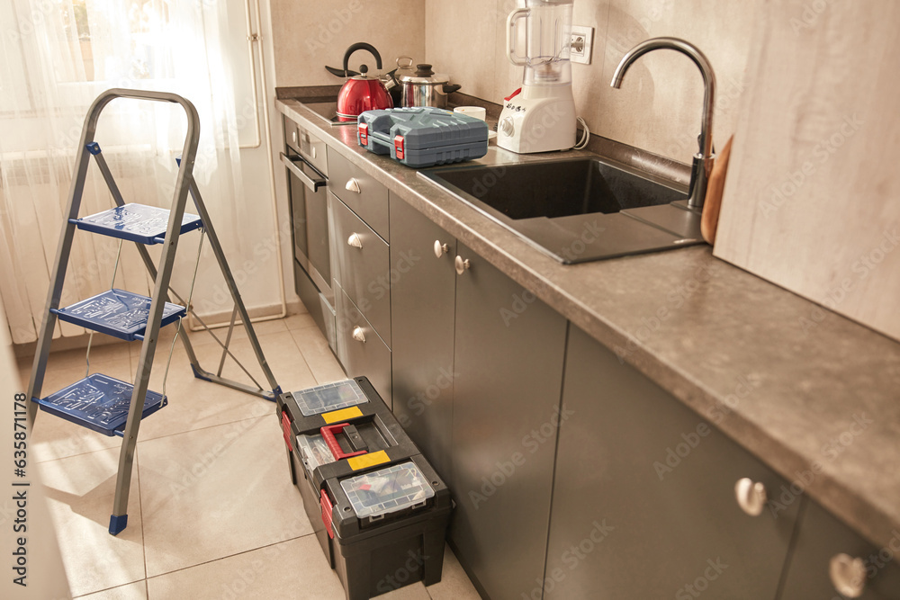 Plumber tools for fixing and repairing water tap on the kitchen sink ...