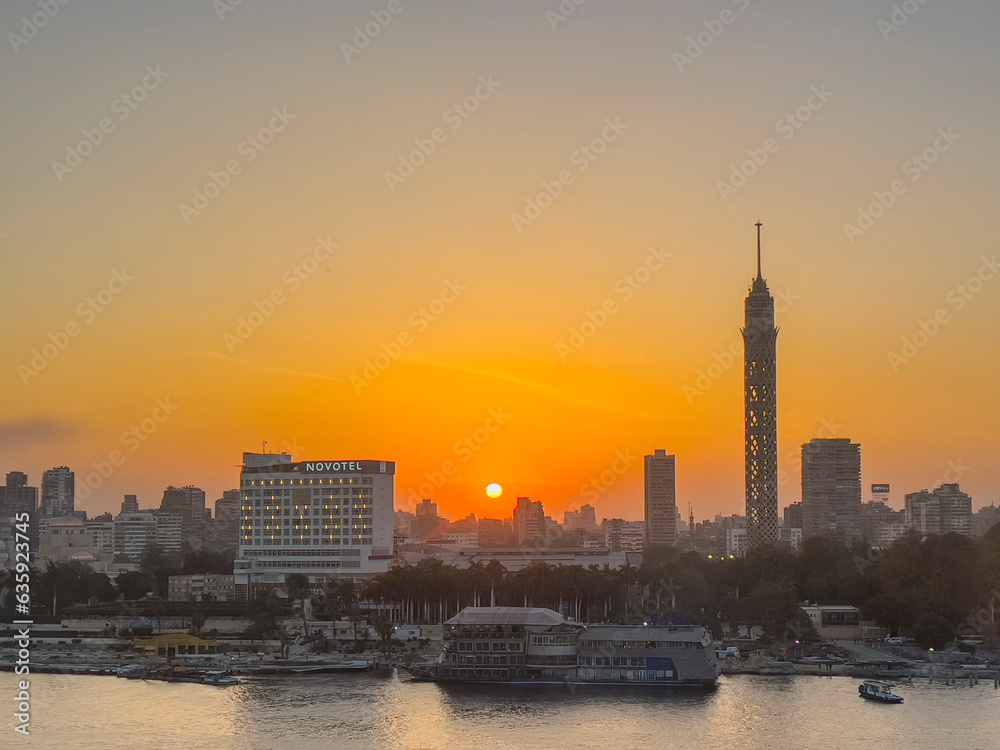 Sunset over the Cairo Tower from the east side of the Nile River, Cairo ...
