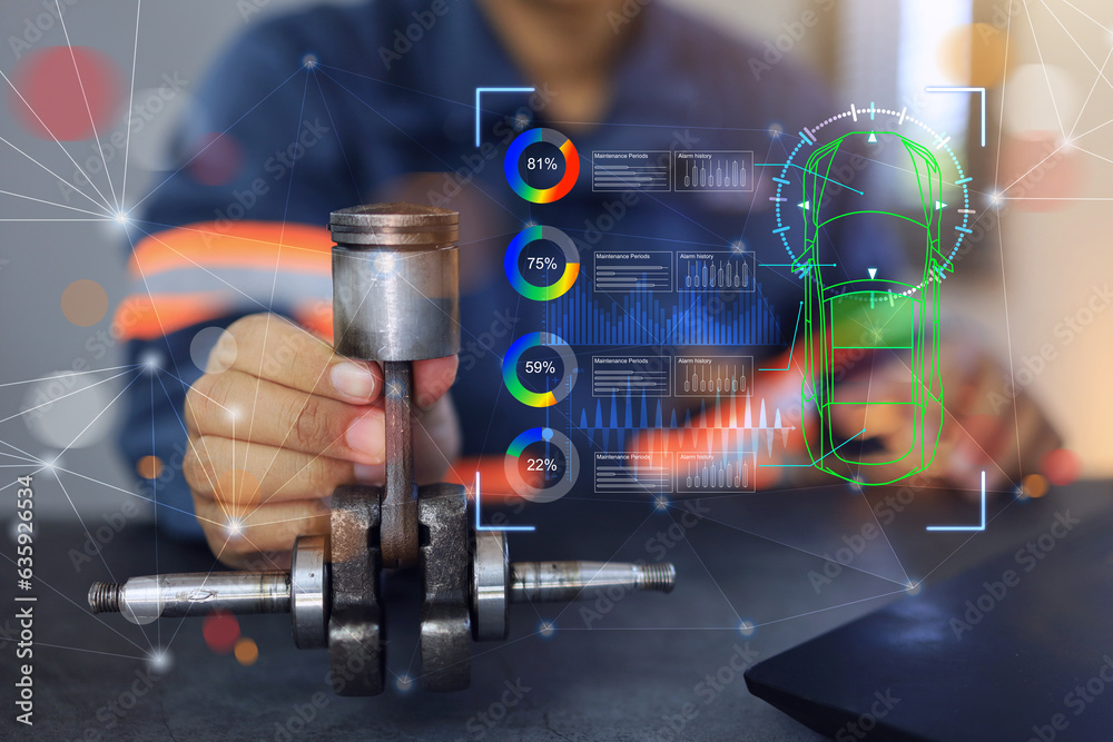 Mechanical engineer holding piston of internal combustion engine in ...