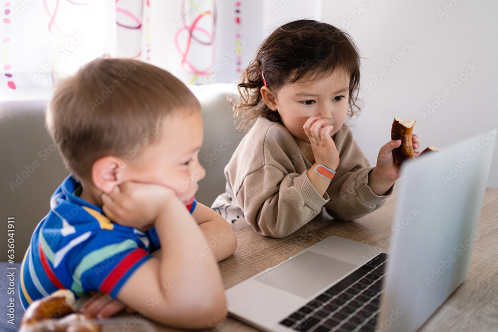 kids watching cartoons Stock Photo | Adobe Stock