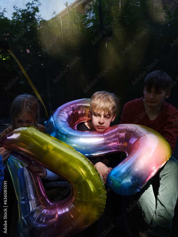 Teens waiting for a party to start Stock Photo | Adobe Stock