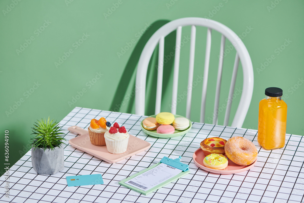 Bakery, credit card, bill of food with orange juice on table Stock ...